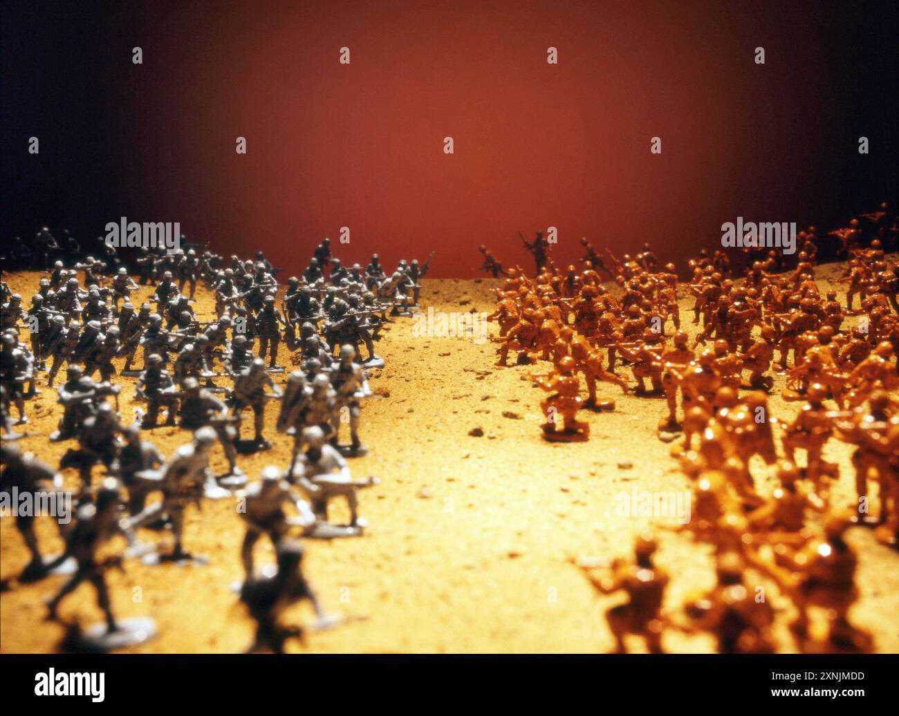 War! Two sets of model soldiers in conflict, one blue, the other red ...