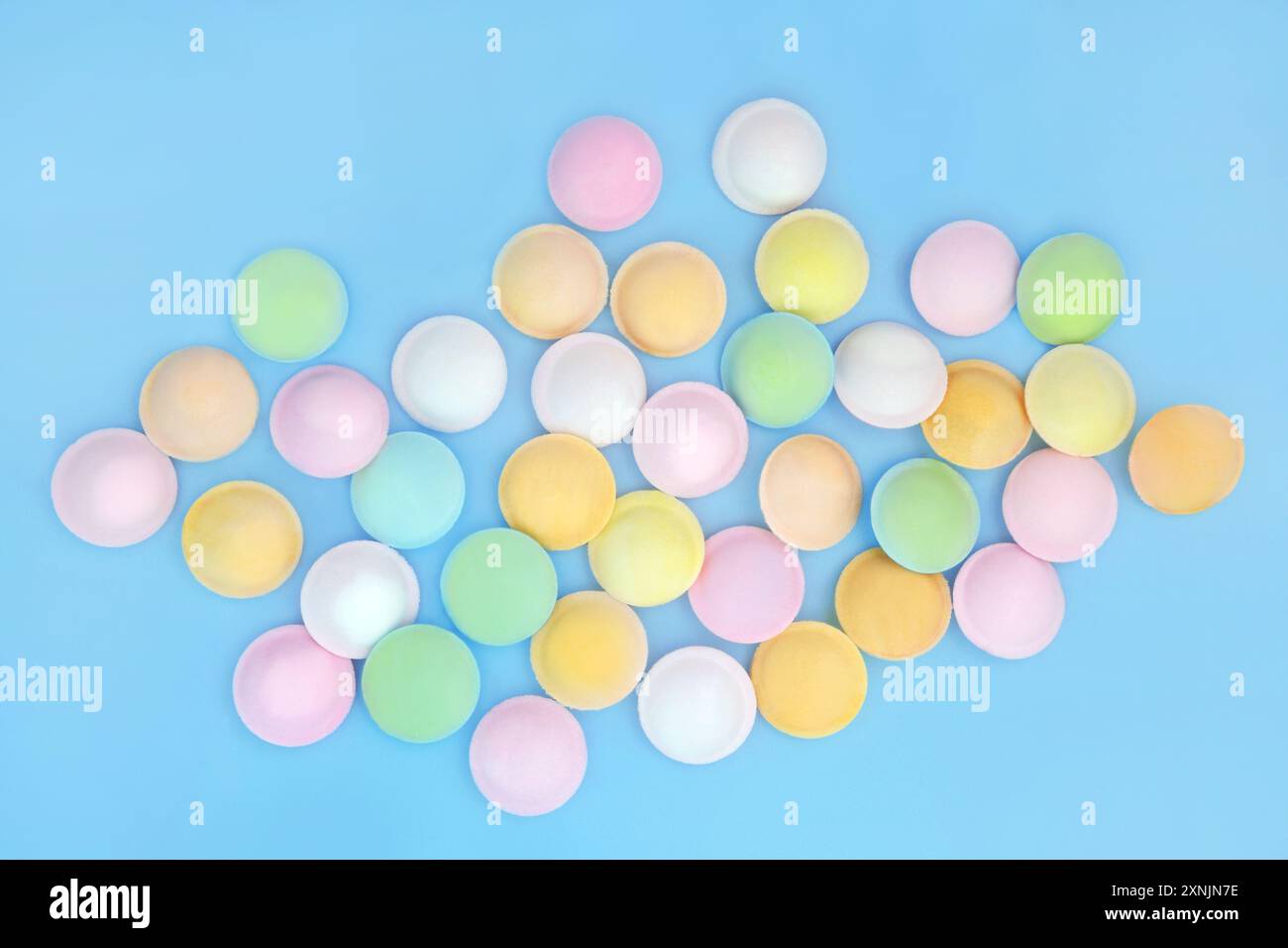 Flying saucer sherbet sweet treat food on blue background. Abstract ...