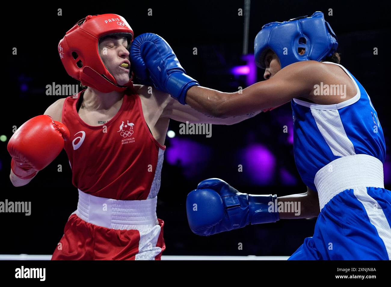 Australia's Monique Suraci, left, fights Colombia's Ingrit Valencia in ...