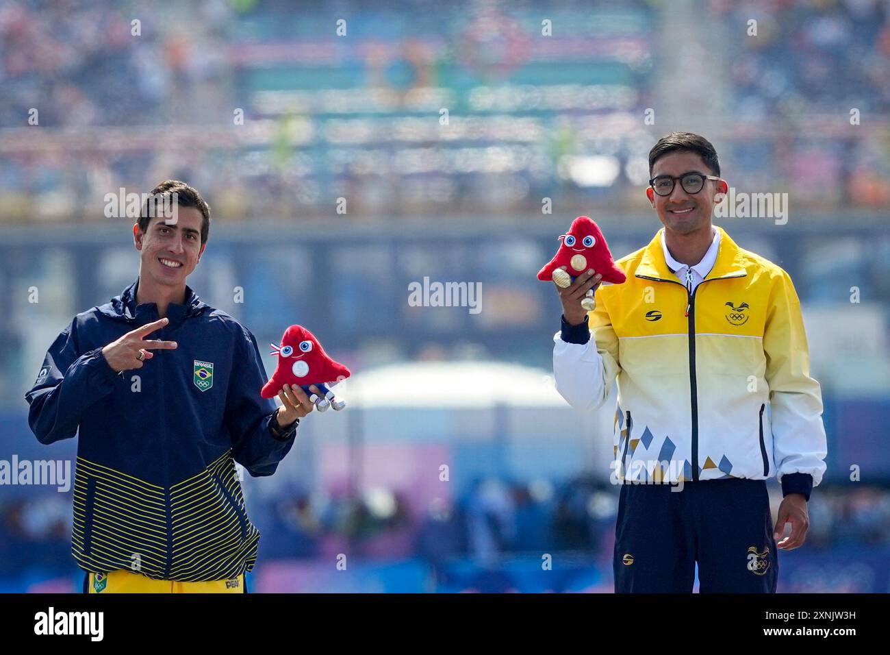 Gold medalist Brian Daniel Pintado, of Ecuador, right, and silver ...