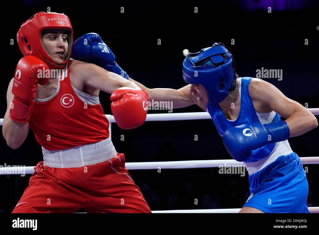 Turkey's Busenaz Surmeneli, left, fights Poland's Aneta Rygielska in ...