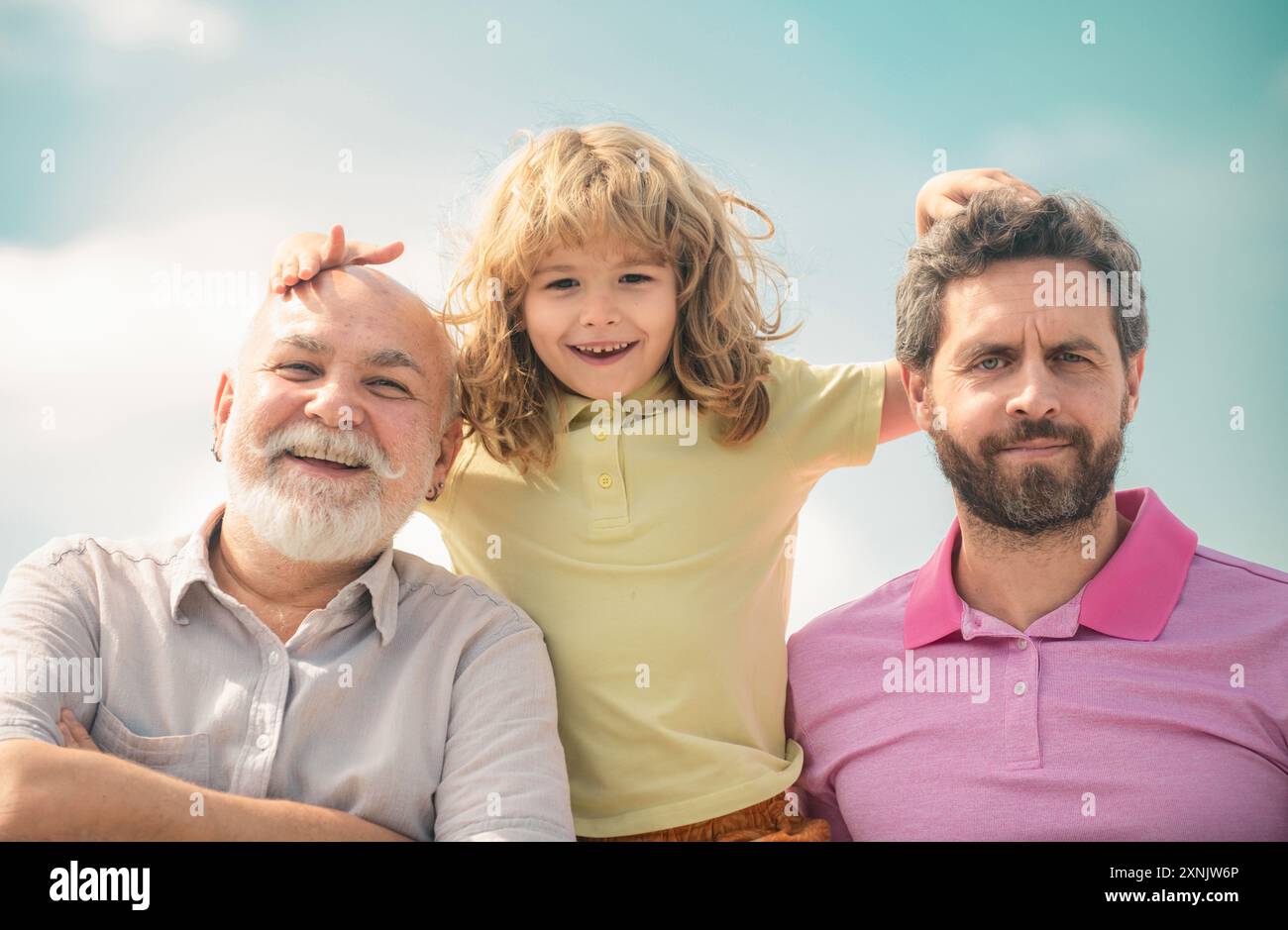 Men generation portrait of grandfather father and funny son child ...