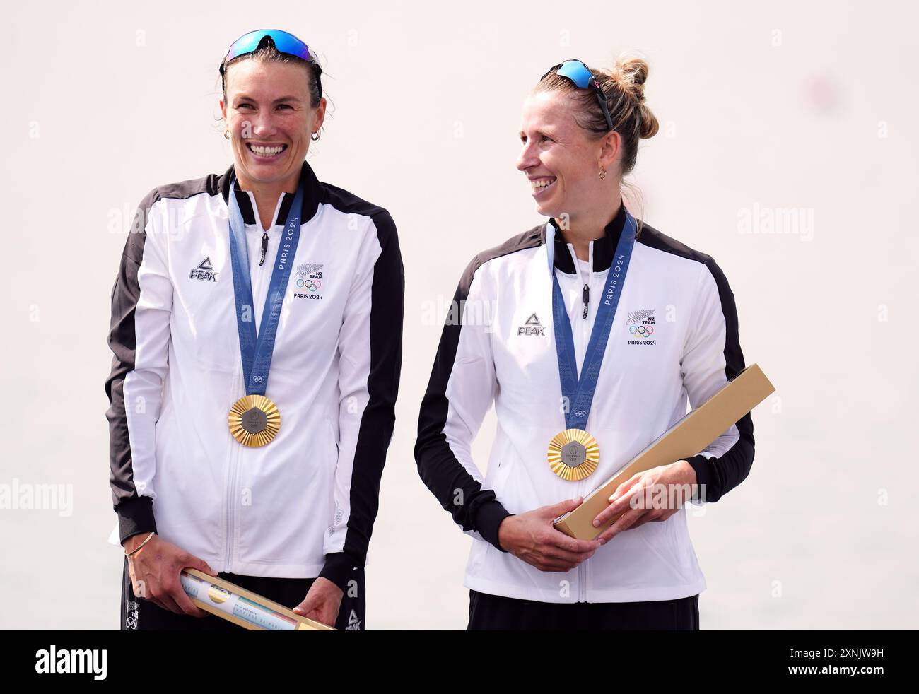 New Zealand's Brooke Francis and Lucy Spoors (gold) during the medal ...