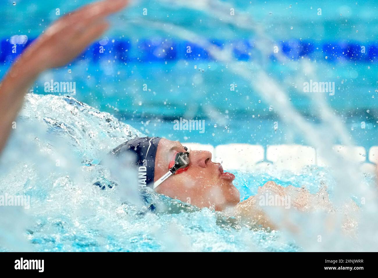 Leon Marchand, of France, competes in the men's 200-meter individual ...