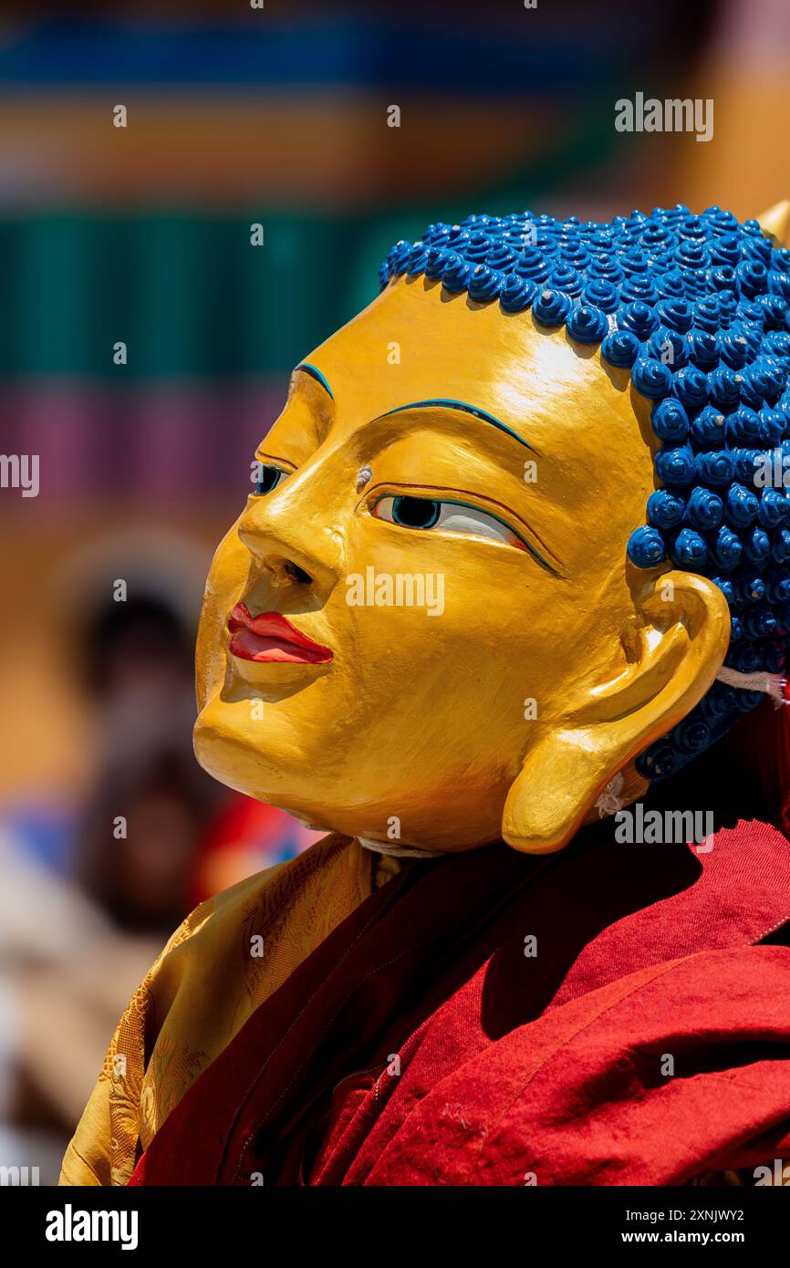 Colorful mask resembling of Gautam Buddha worn by a man during Hemis ...