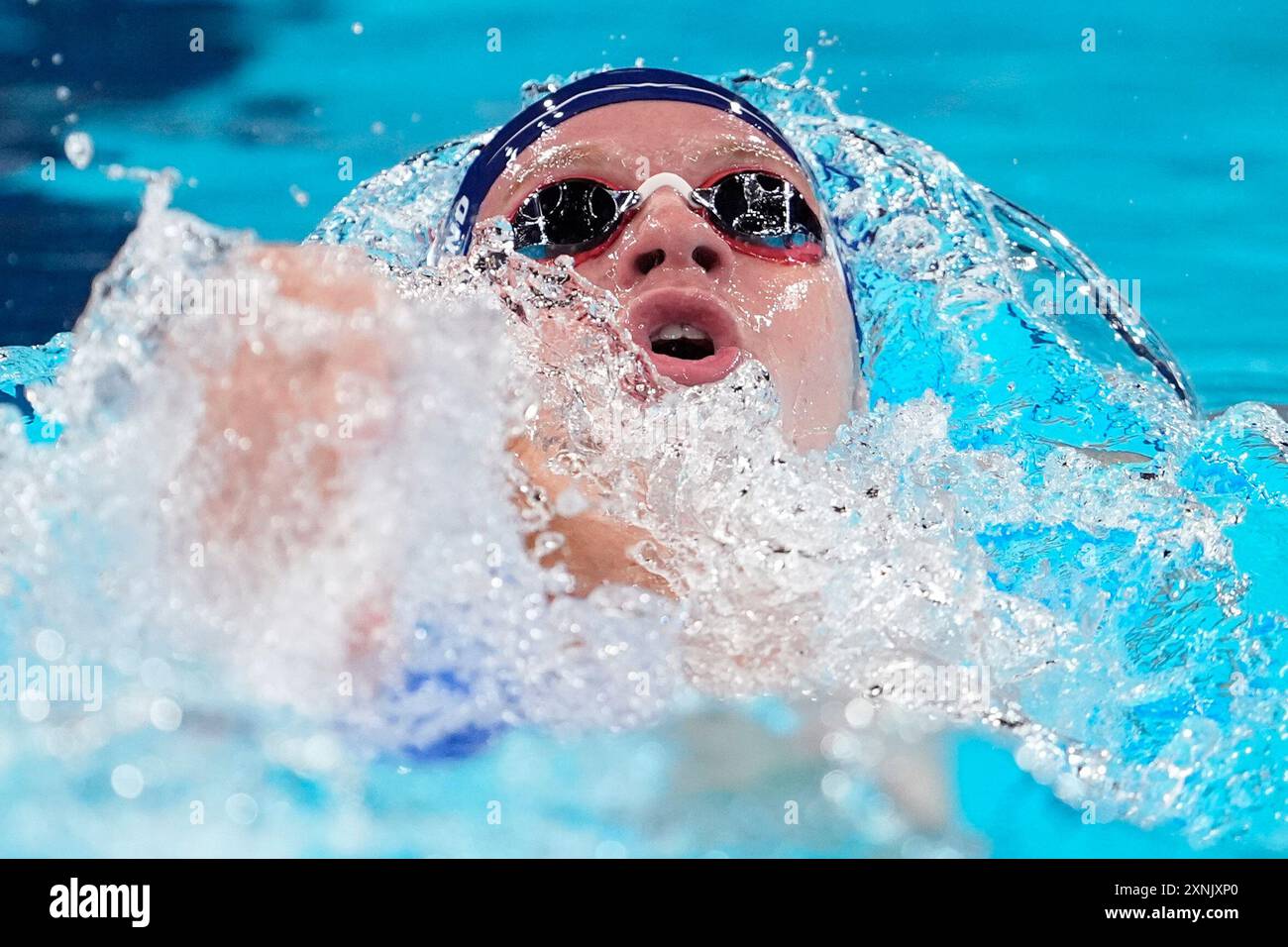 Leon Marchand, of France, competes in a heat of the men's 200-meter ...