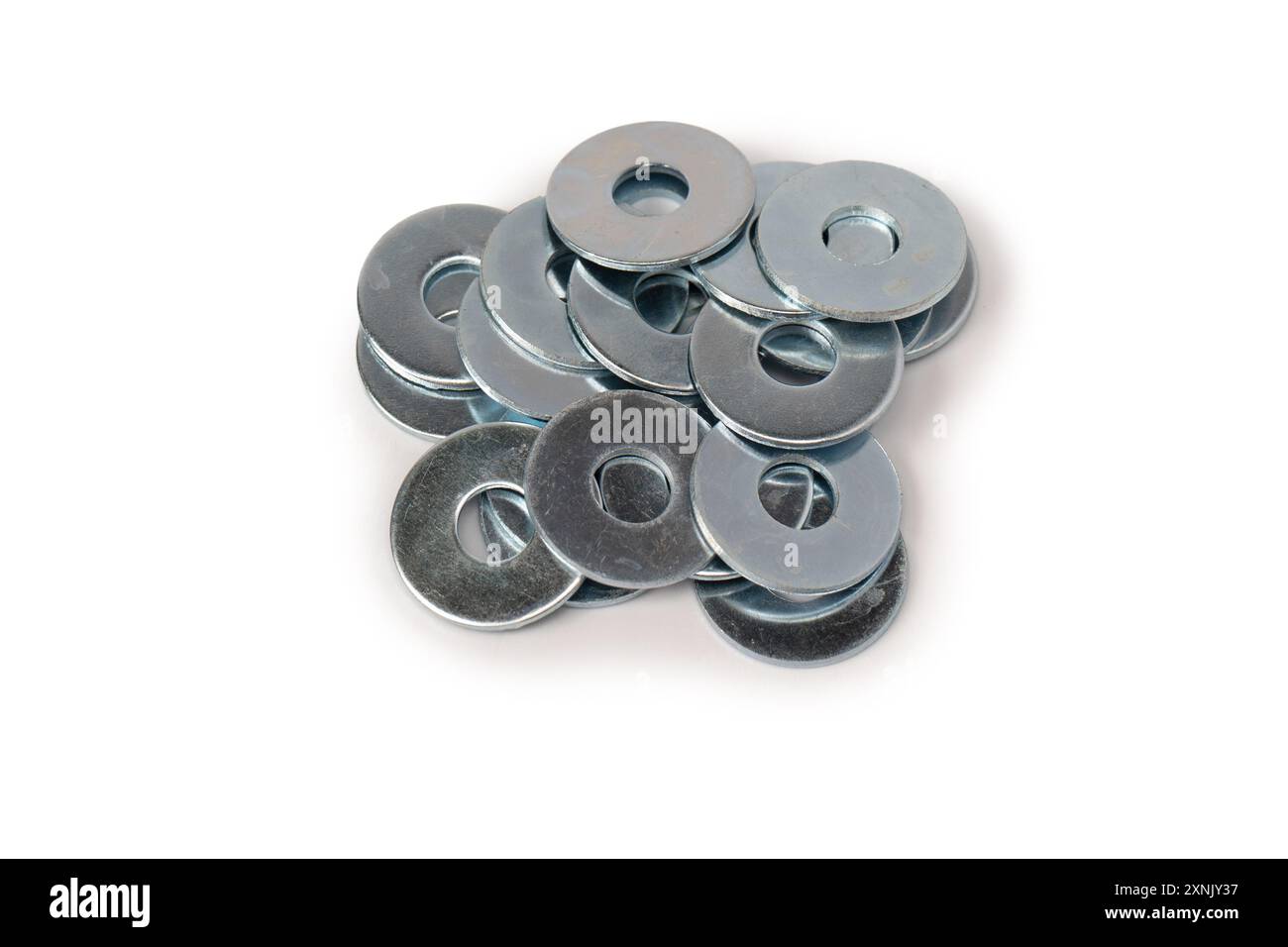 Metal washer isolated on a white background Stock Photo - Alamy