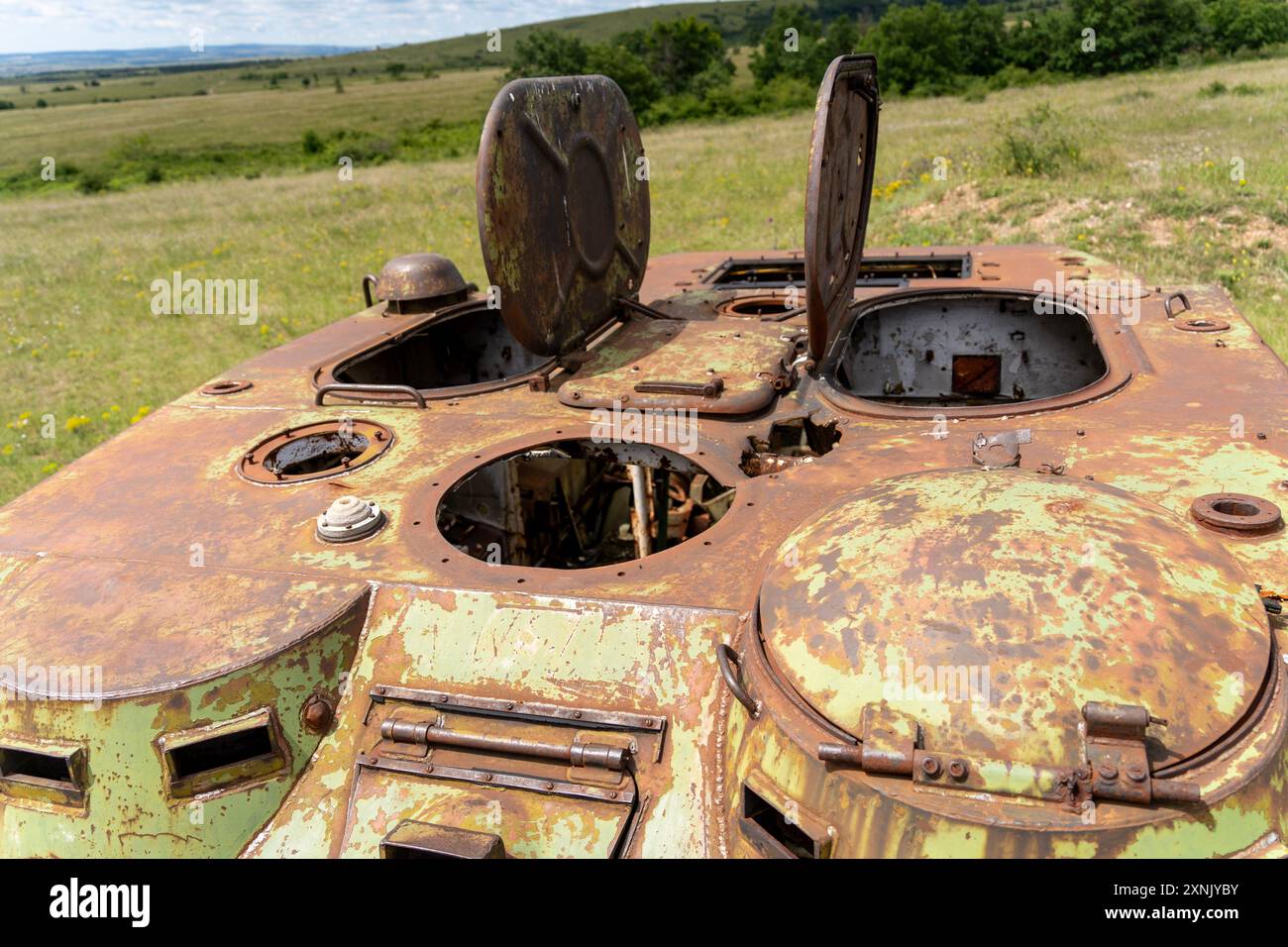 Rusty old soviet military vehicle wreck in a field Stock Photo - Alamy