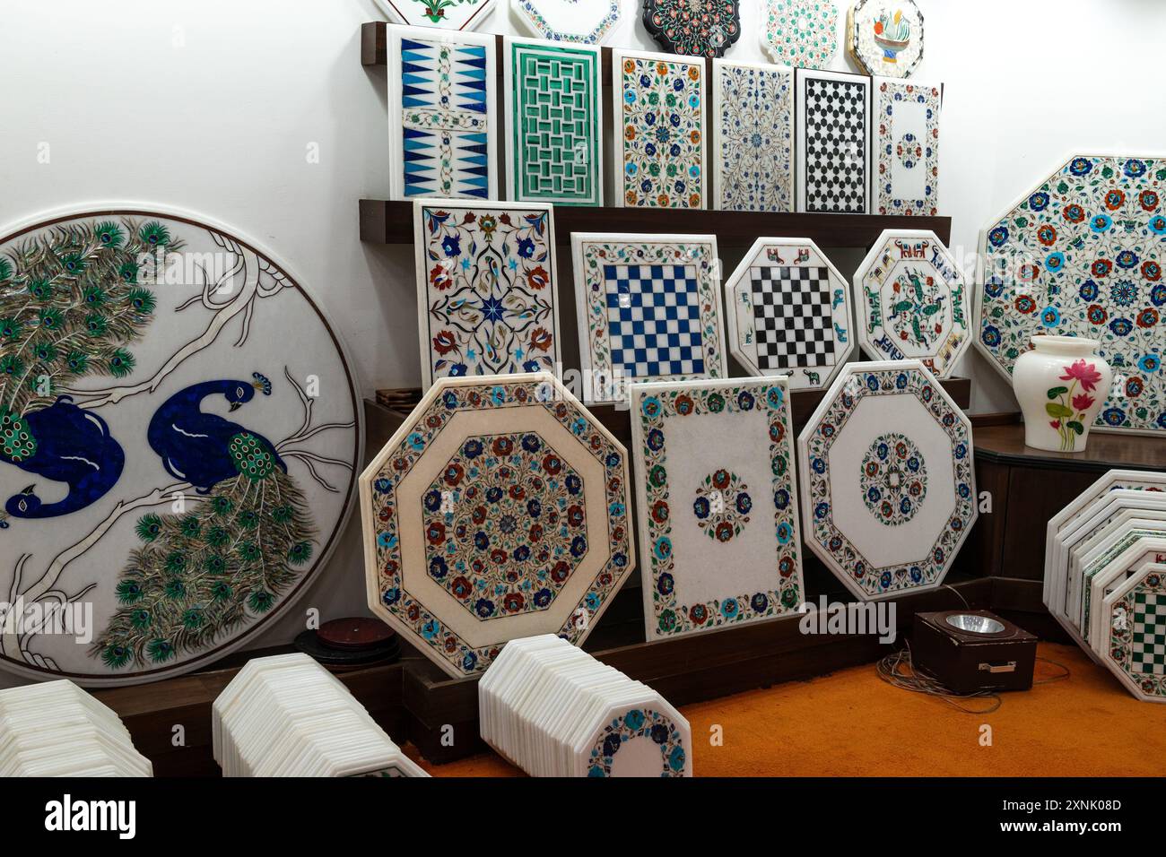 Agra, India 02/14/2024 Hand made marble and precious stone inlay tables ...