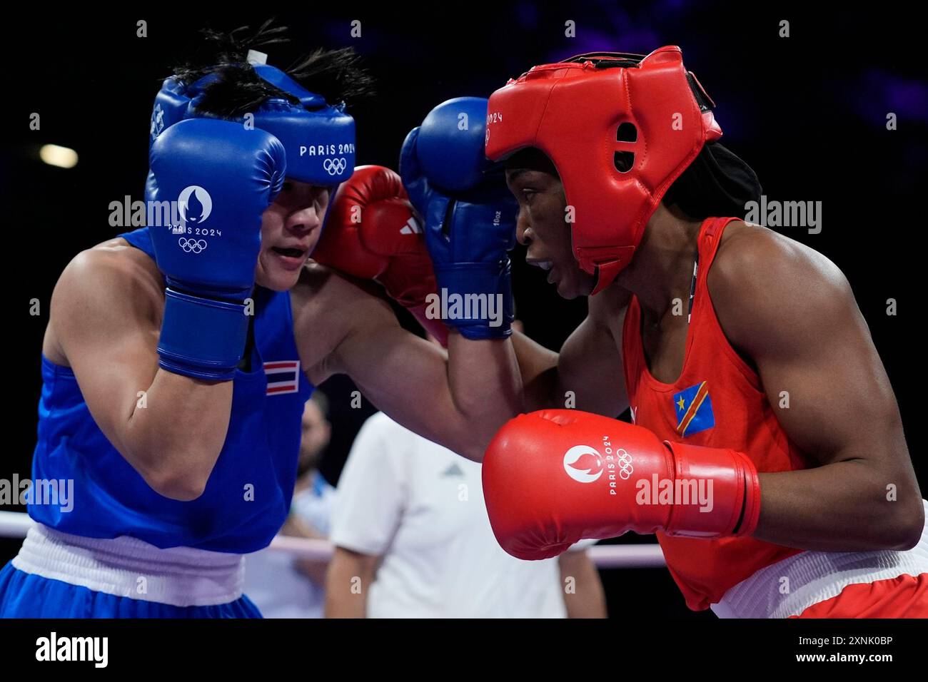 Democratic Republic of the Congo's Brigitte Mbabi, right, fights ...