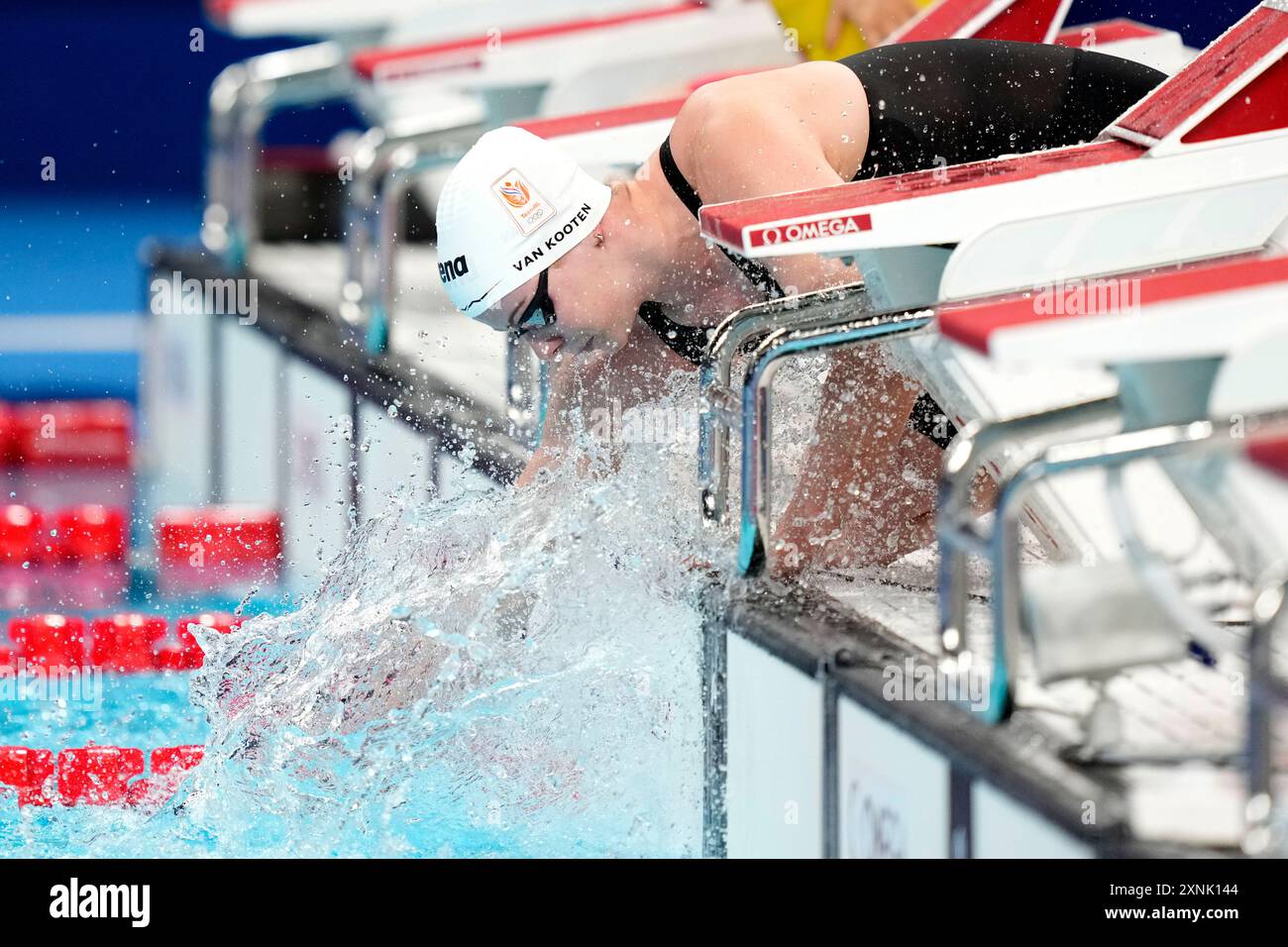 Netherlands' Janna Van Kooten splashes the water as she prepares to compete in the women's 4x200 ...