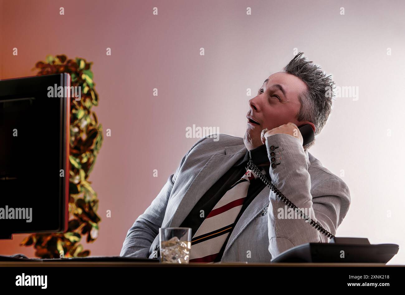 Hiding alcohol at work desk hi-res stock photography and images - Alamy