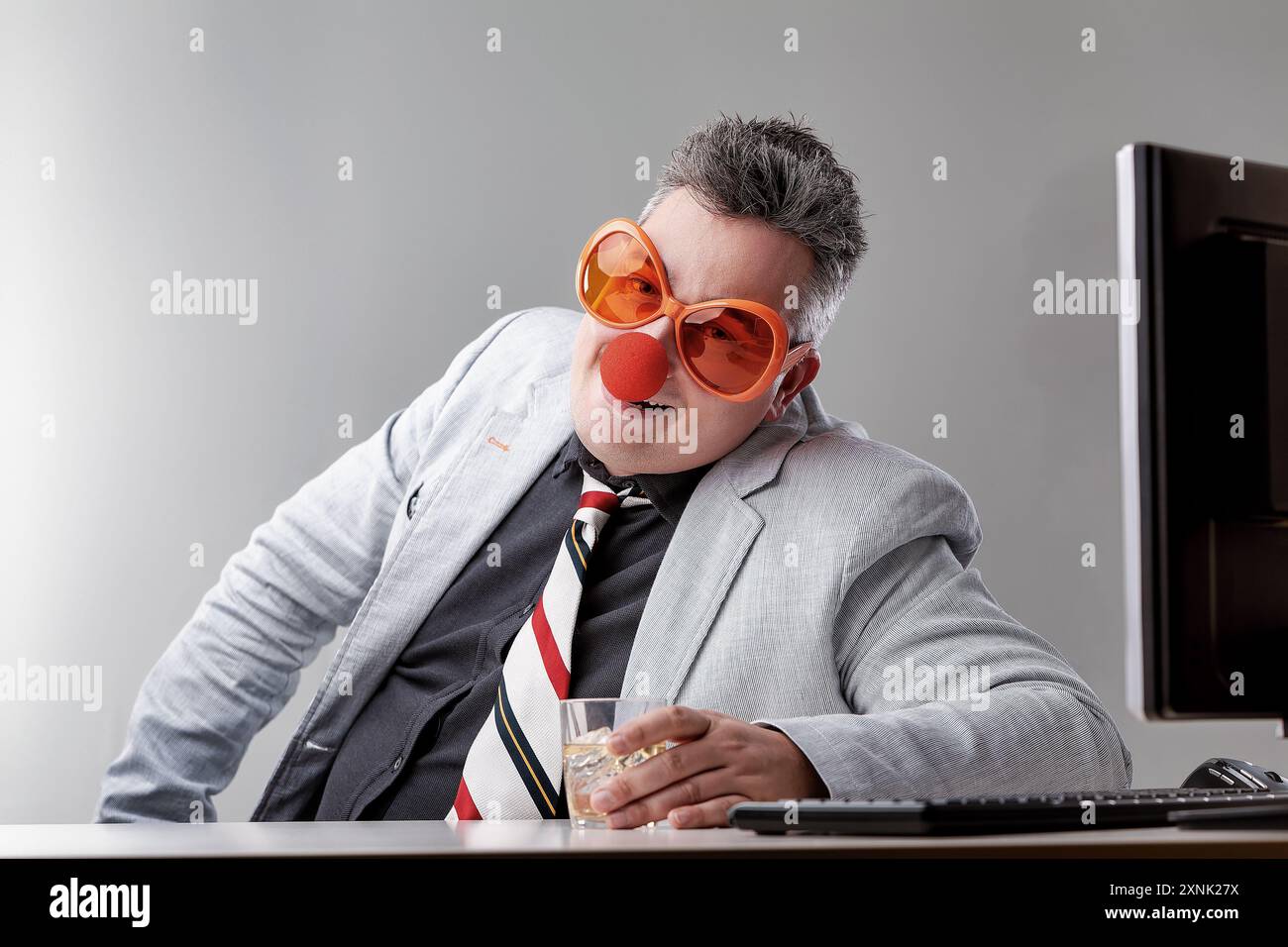 Hiding alcohol at work desk hi-res stock photography and images - Alamy