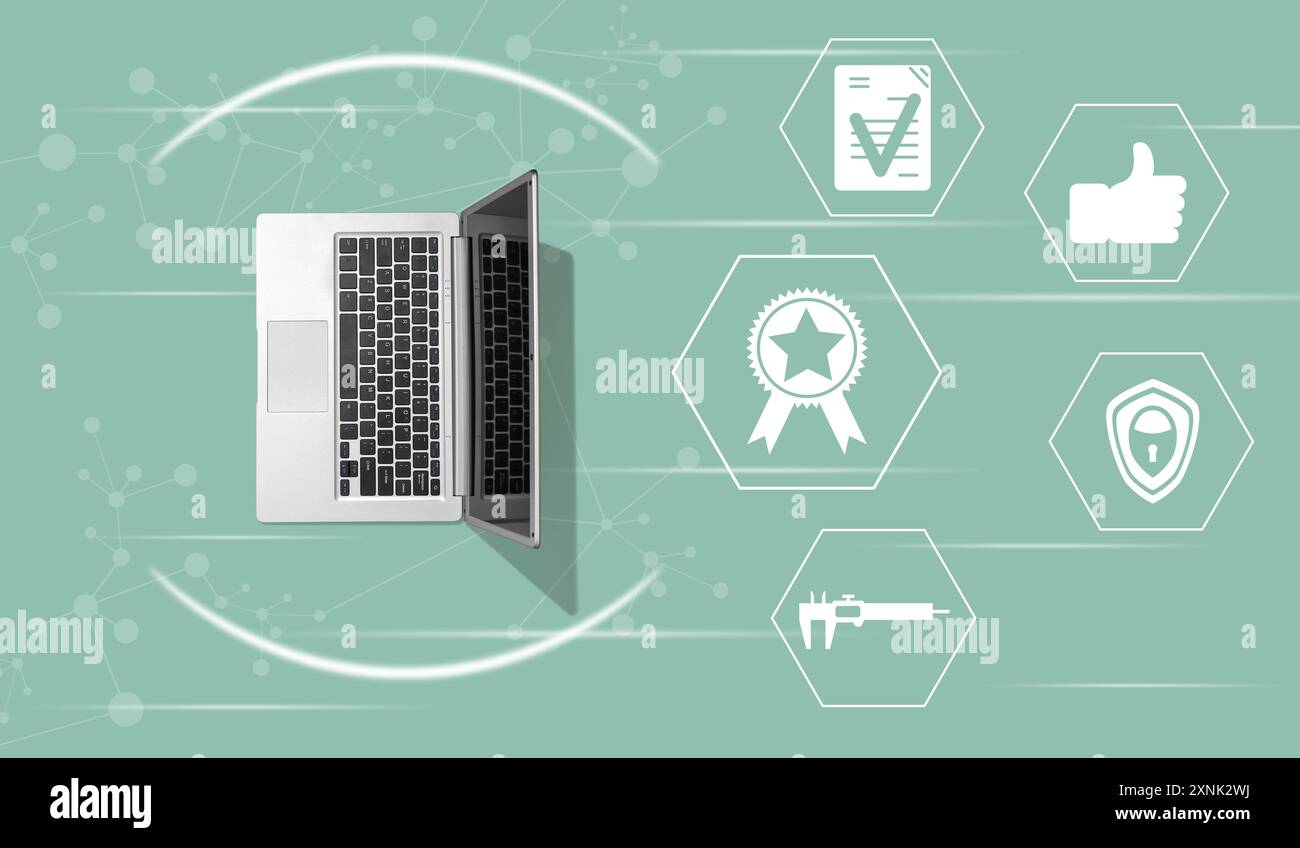 Top view of laptop with symbol of quality concept Stock Photo - Alamy