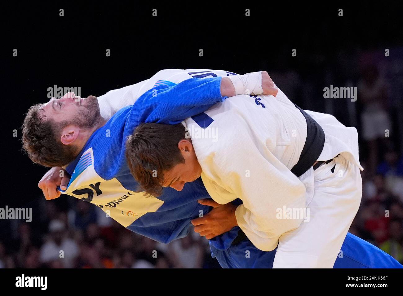 Switzerland's Daniel Eich and Spain's Nikoloz Sherazadishvili compete during their men's -100 kg ...
