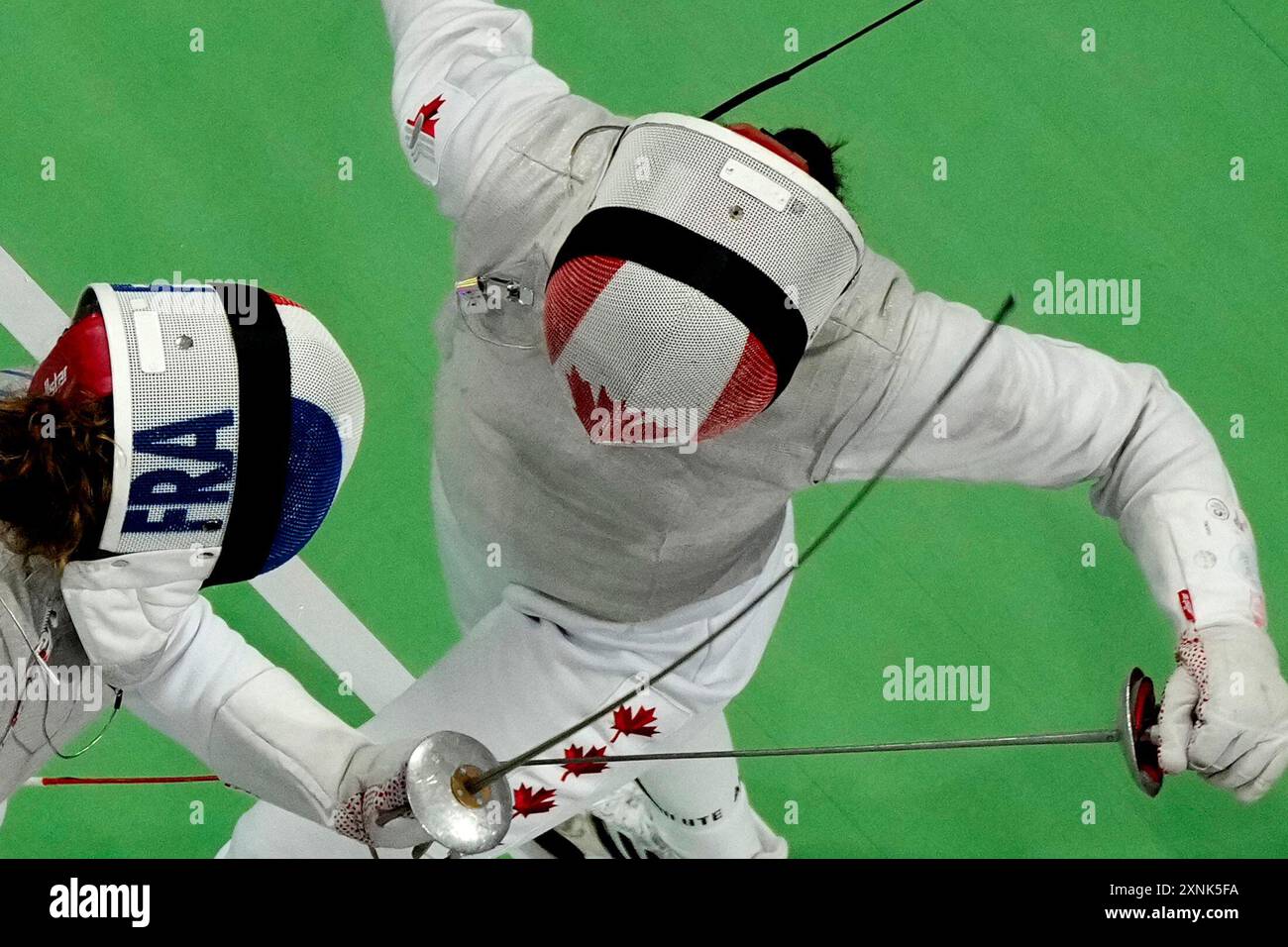 France's Eva Lacheray, left, competes with Canada's Jessica Zi Jia Guo ...