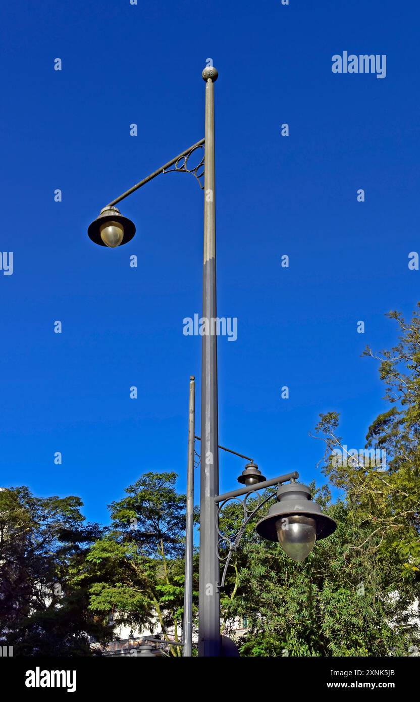 Antique street lamp against a blue sky in Petropolis, Rio de Janeiro ...