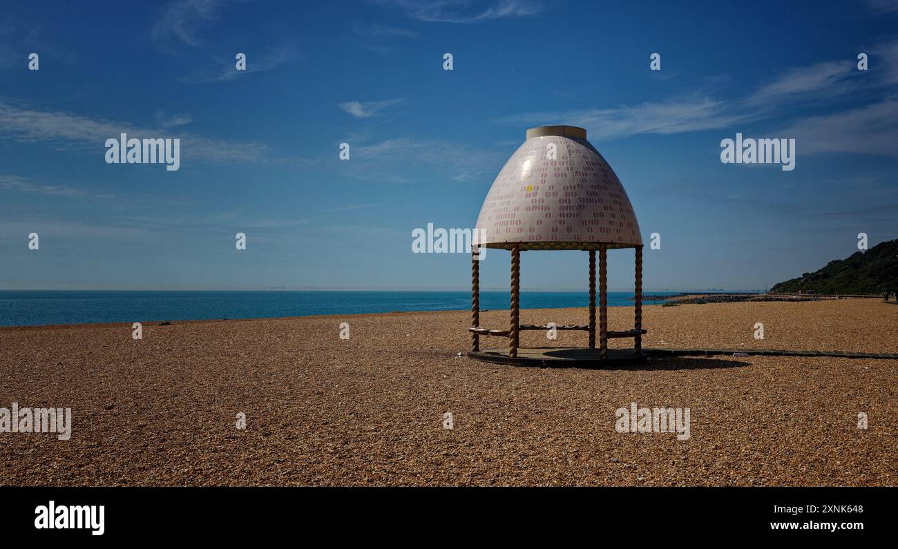 Beach shelter on Folkestone Beach in Kent UK Stock Photo - Alamy