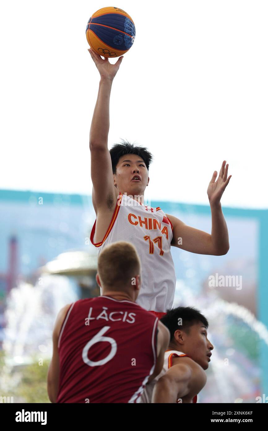 Paris, France. 1st Aug, 2024. Zhao Jiaren (top) of China shoots during ...