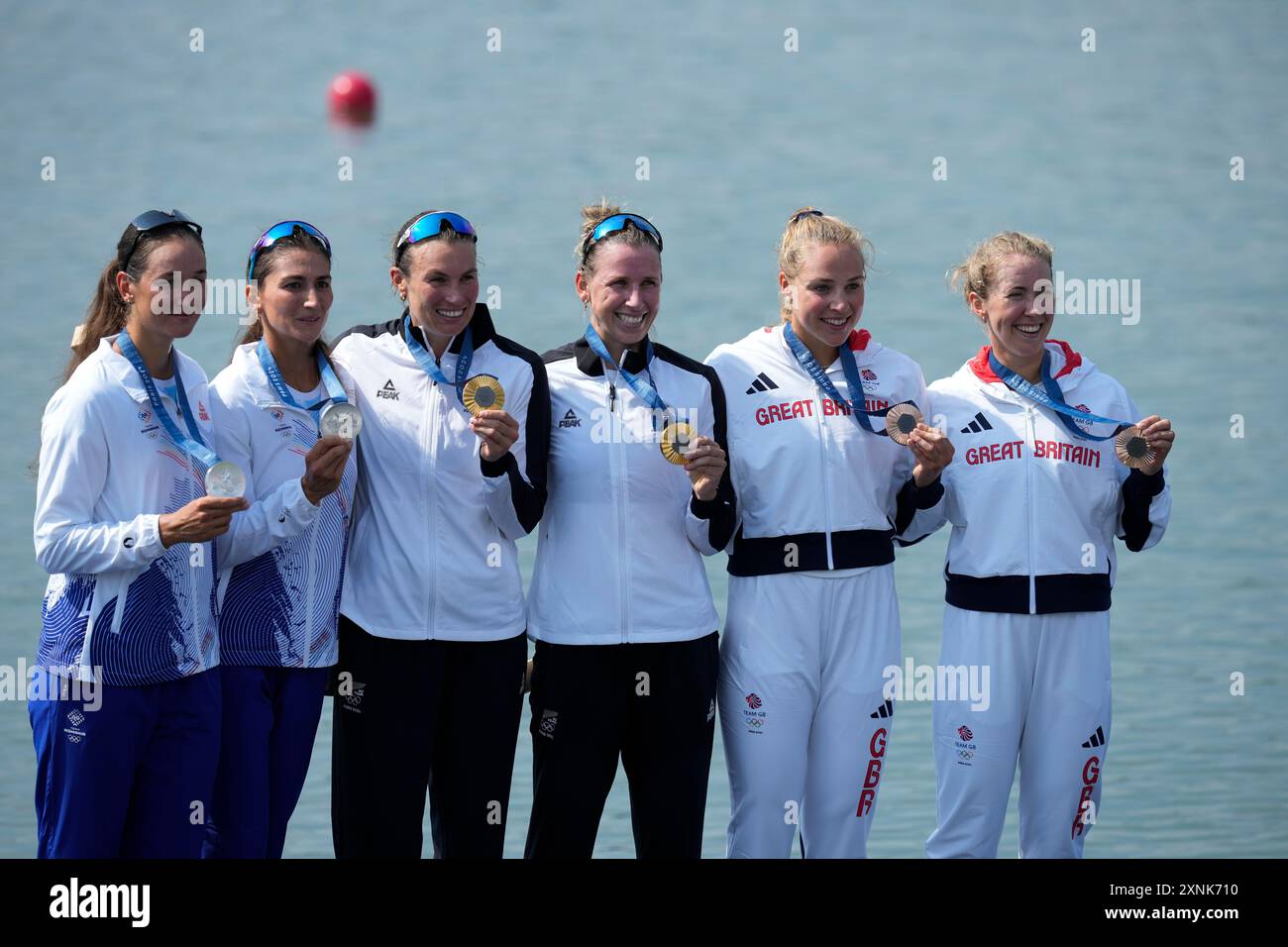 Silver medalists Romania's Simona Radis and Ancuta Bodnar, left, gold ...