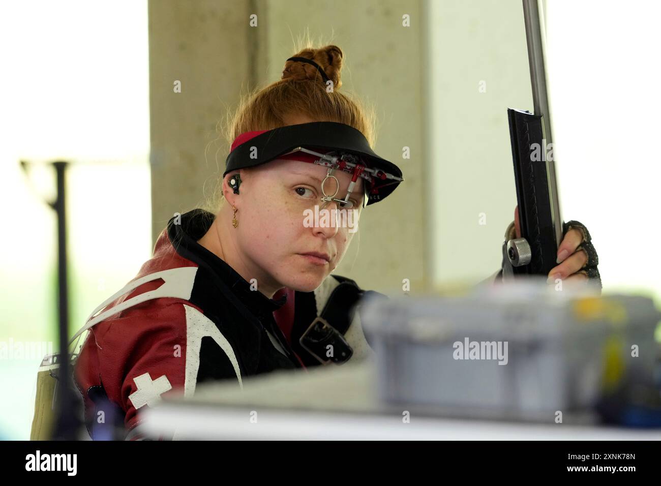Switzerland's Nina Christen gestures as she competes in the 50m rifle 3 ...