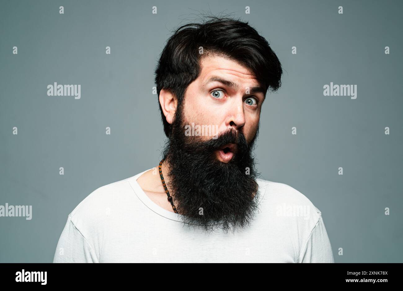 Head And Shoulders Portrait Of Surprised Handsome Man Shocked Male