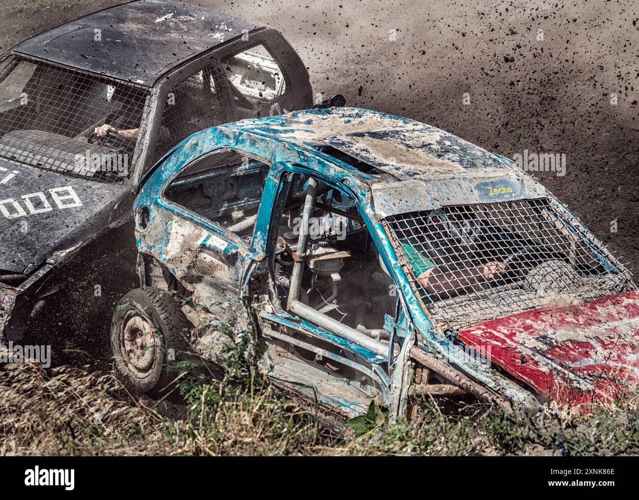 A dramatic photograph capturing a thrilling demolition derby crash with ...