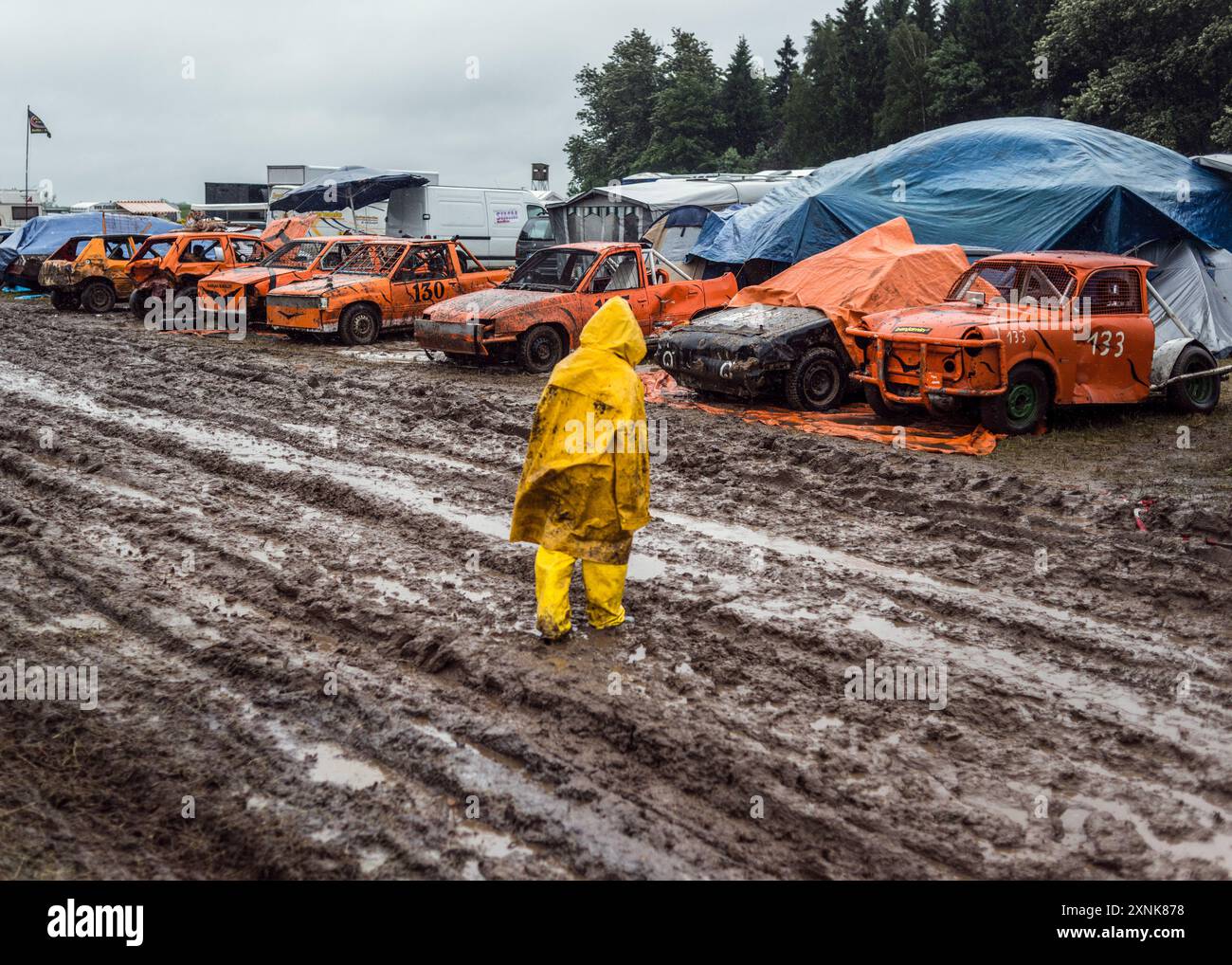 Demolition car race in muddy conditions in Brandenburg, featuring ...