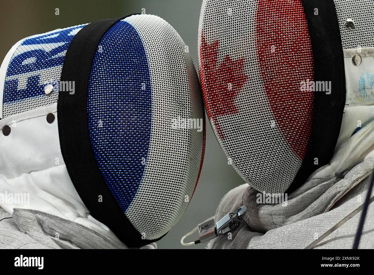 Canada's Jessica Zi Jia Guo, right, competes with France's Pauline ...