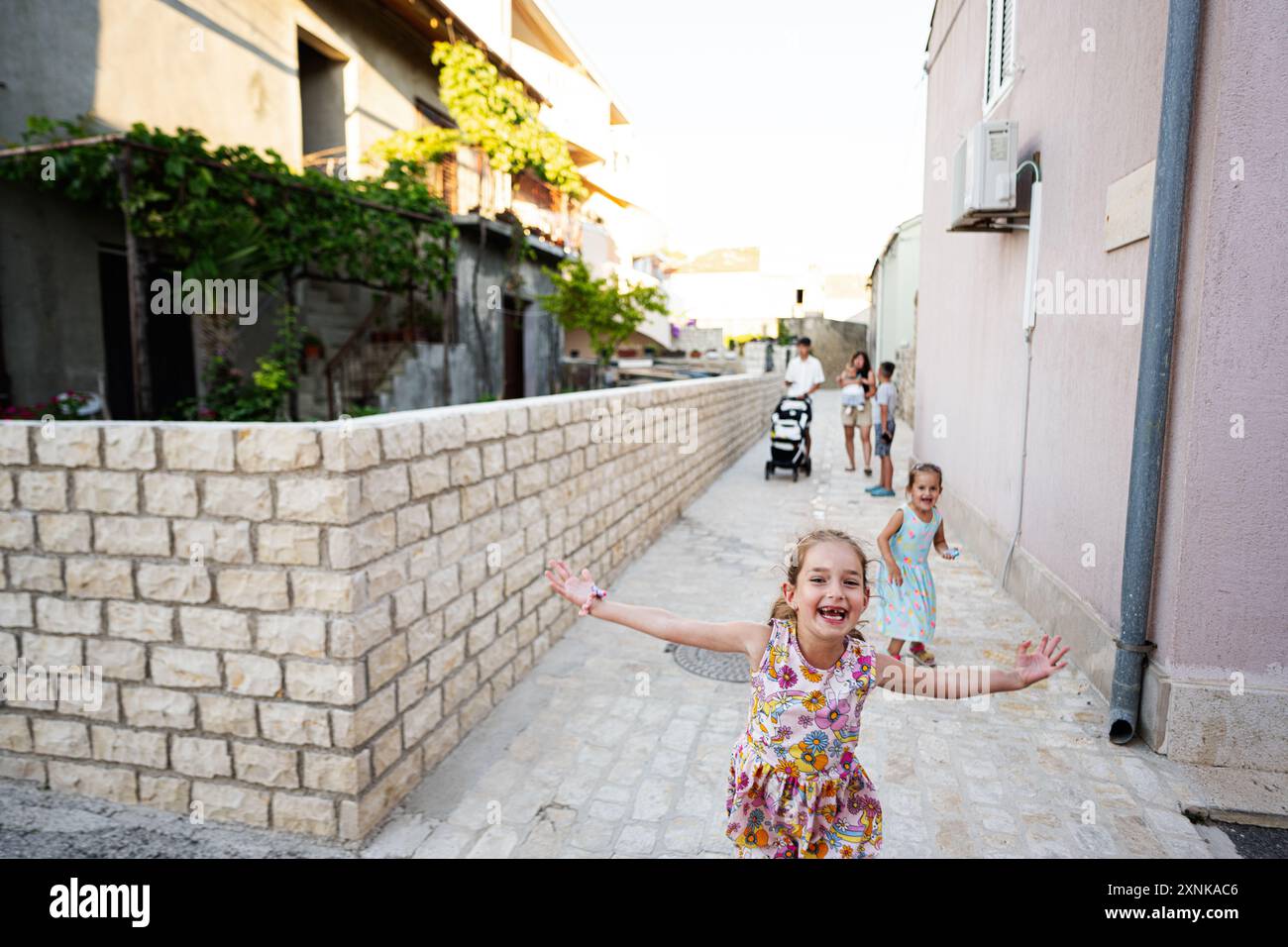 Excited children running together hi-res stock photography and images ...