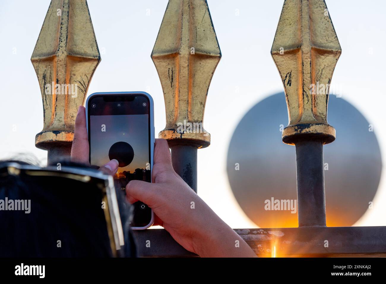 The Olympic cauldron rises every evening after sunset in a giant ...