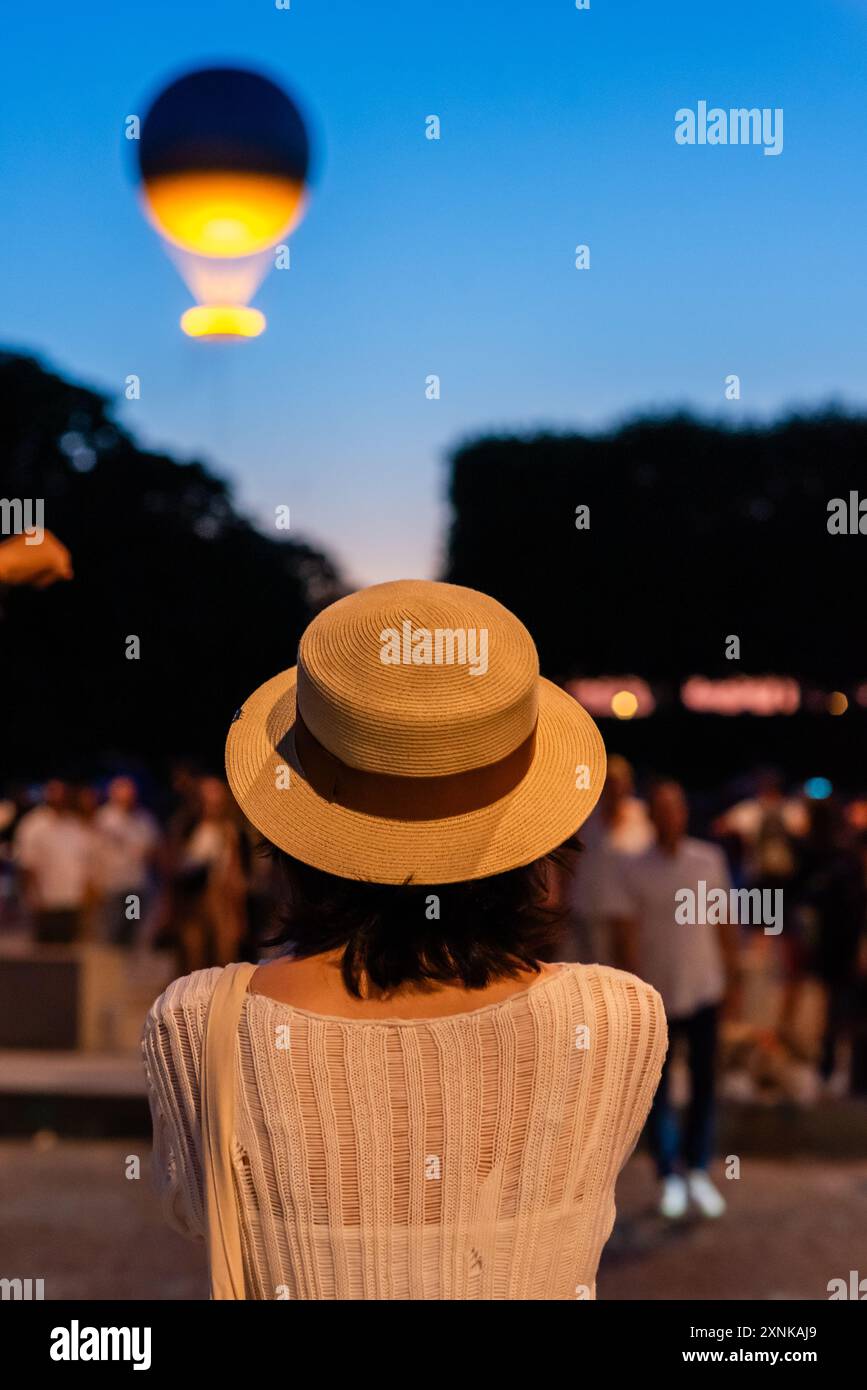 The Olympic cauldron rises every evening after sunset in a giant ...
