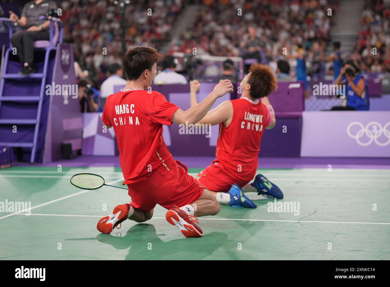 China's Liang Weikeng and Wang Chang celebrate after defeating ...
