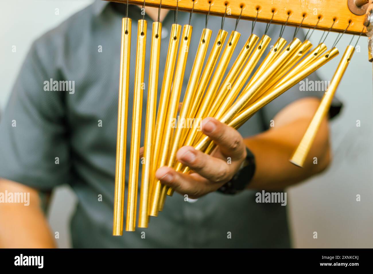Close up hand of musician play bar chimes, selective focus Stock Photo ...