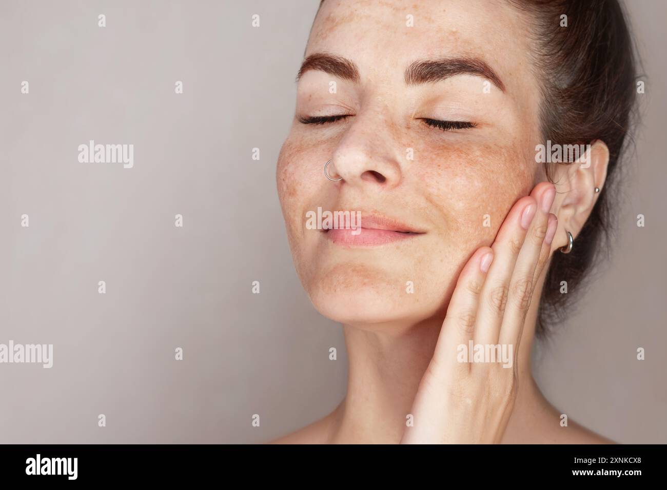 Sun spots face hi-res stock photography and images - Alamy