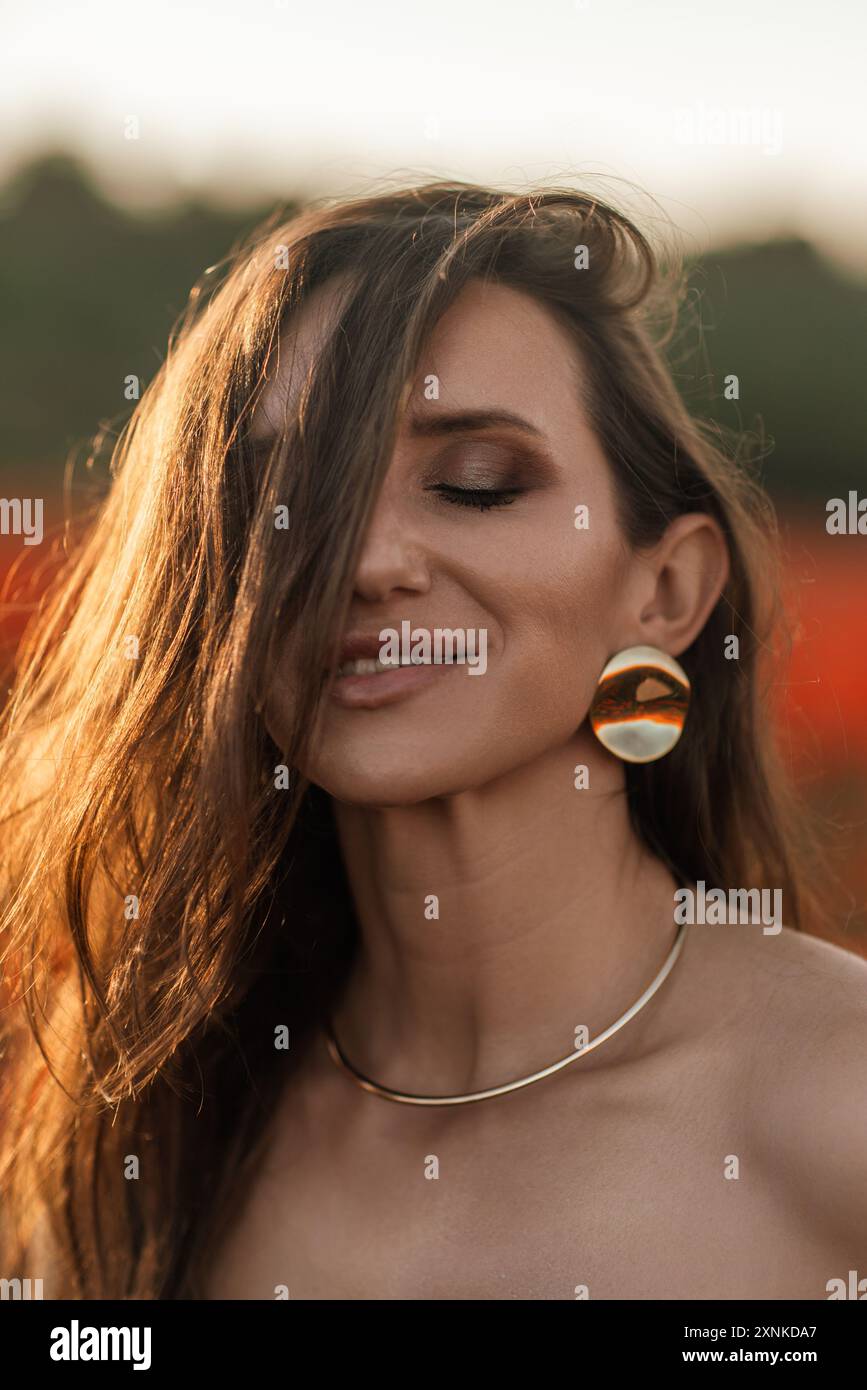Female model wearing golden hi-res stock photography and images - Alamy