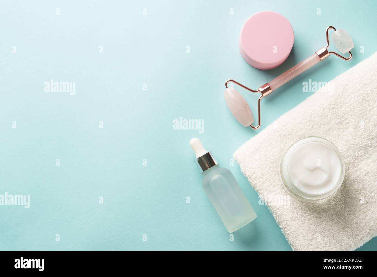 Skin care products blue background Stock Photo - Alamy