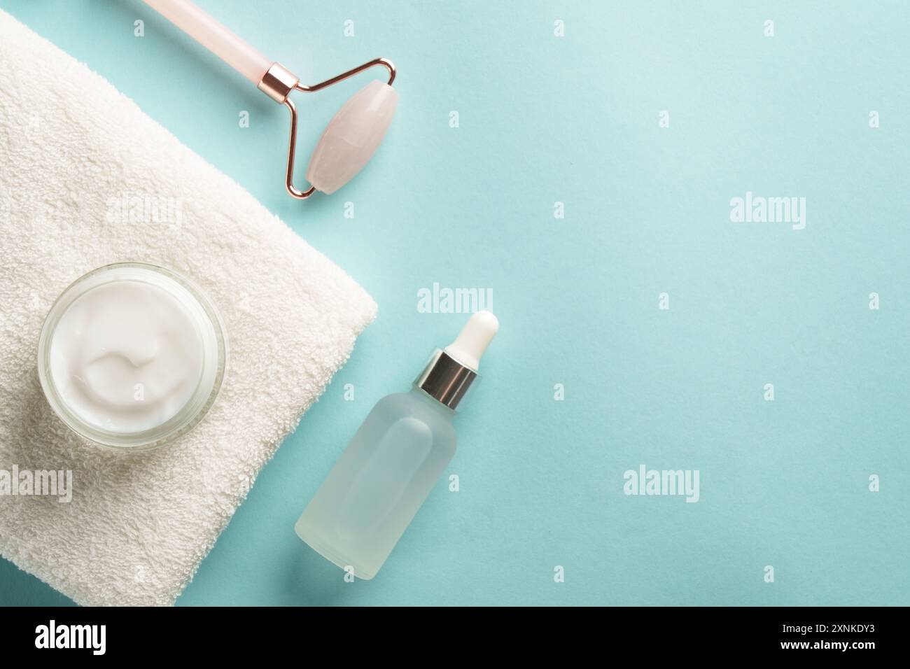 Skin care products blue background Stock Photo - Alamy