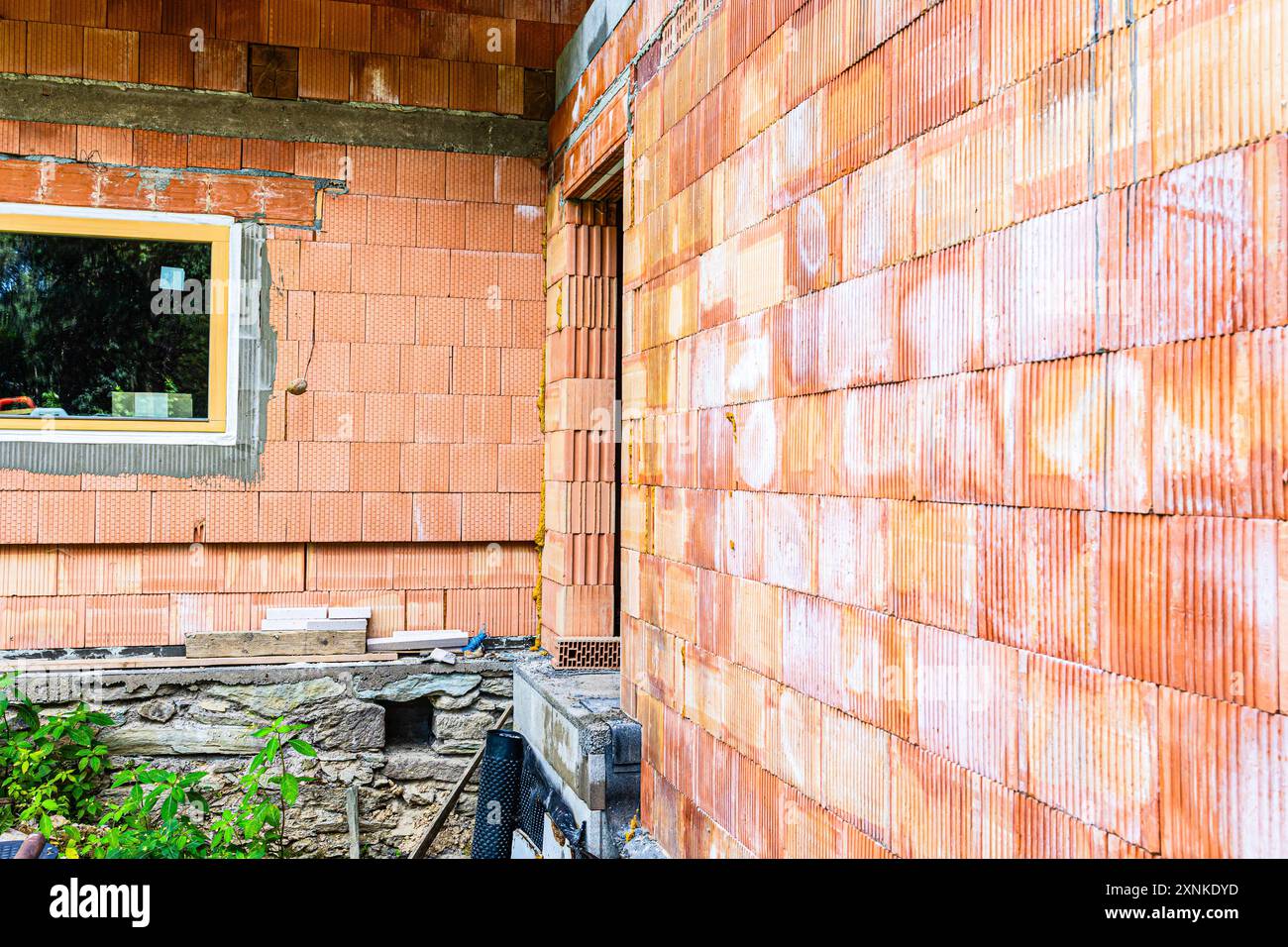Exterior concrete block walls of a house under construction Stock Photo ...
