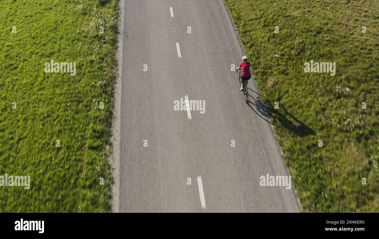 Aerial view woman riding bicycle hi-res stock photography and images ...