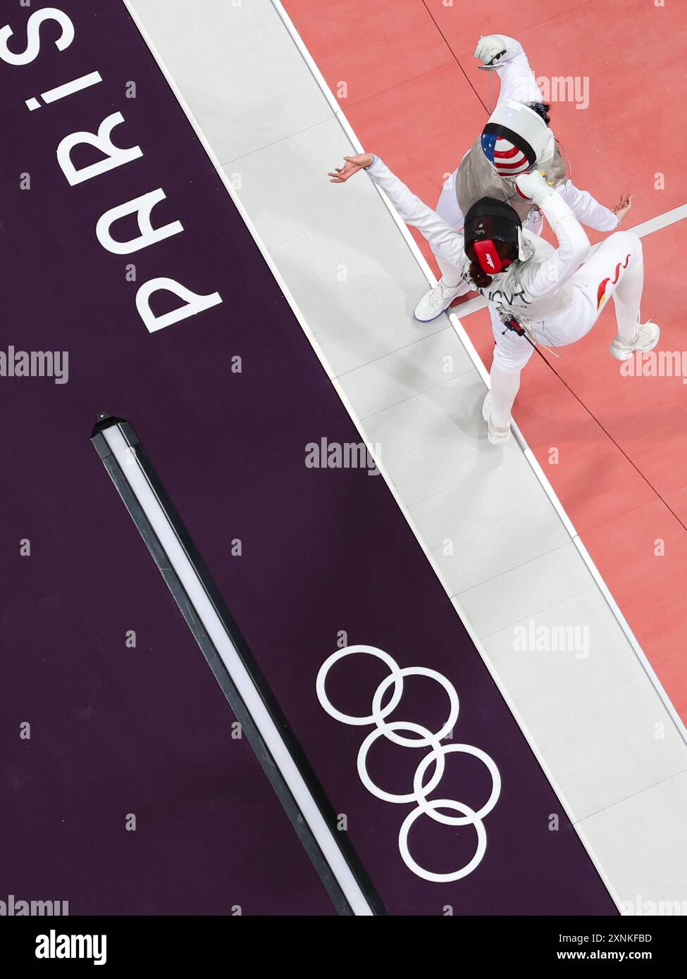 Paris, France. 1st Aug, 2024. Wang Yuting of China (bottom) competes ...