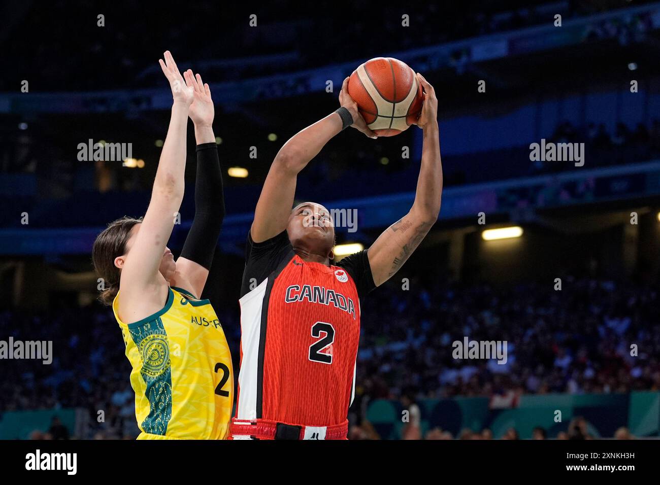 Canada's Shay Colley, right, shoots as Australia's Jade Melbourne ...