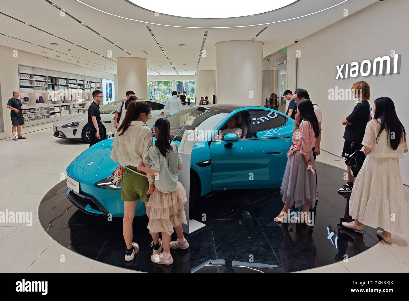 SHANGHAI, CHINA - AUGUST 1, 2024 - Customers experience the Xiaomi SU7 ...