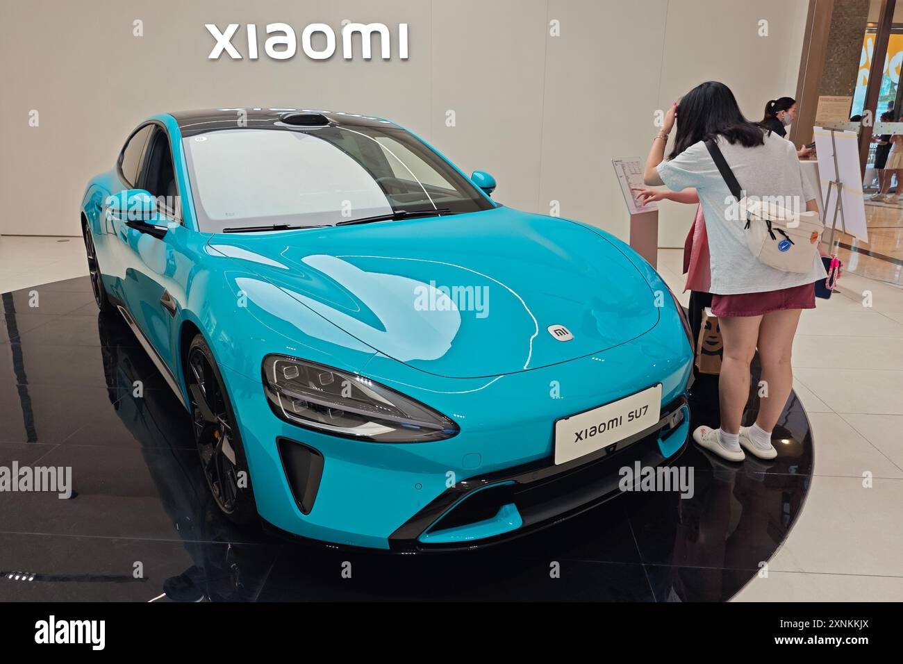 SHANGHAI, CHINA - AUGUST 1, 2024 - Customers experience the Xiaomi SU7 ...