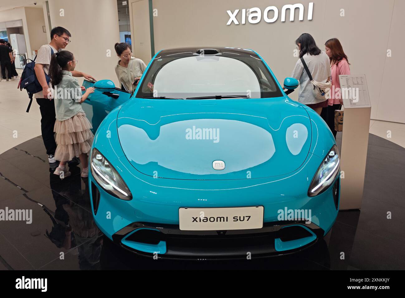 SHANGHAI, CHINA - AUGUST 1, 2024 - Customers experience the Xiaomi SU7 ...