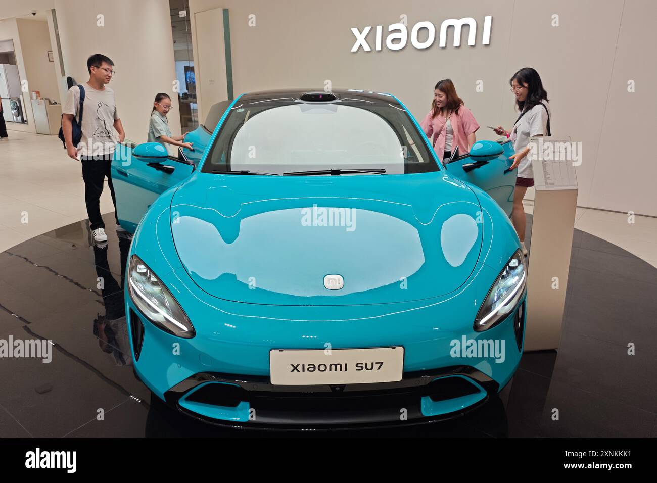 SHANGHAI, CHINA - AUGUST 1, 2024 - Customers experience the Xiaomi SU7 ...