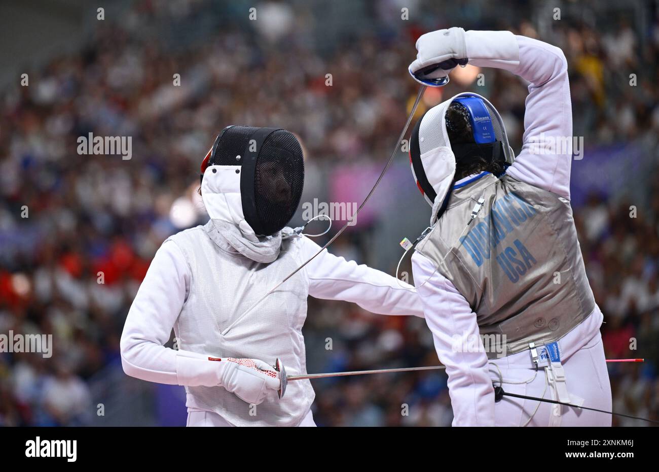 Paris, France. 1st Aug, 2024. Wang Yuting (L) of China competes against ...