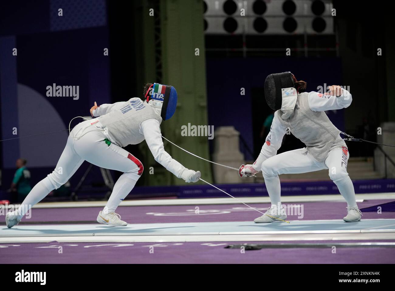 Italy's Alice Volpi, left, competes with Japan's Sera Azuma in the ...
