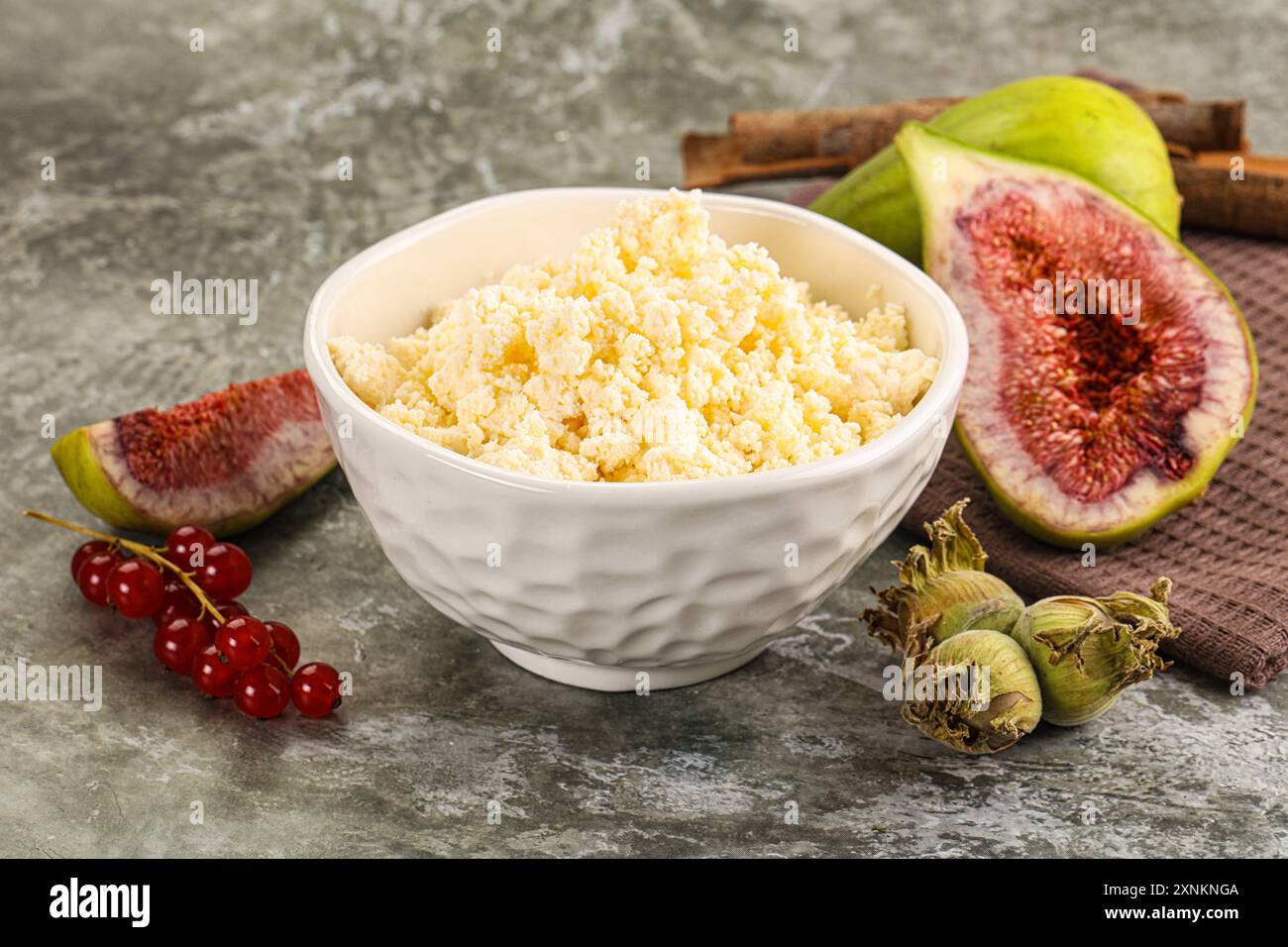 Delicous sheep cottage cheese curd served fig Stock Photo - Alamy