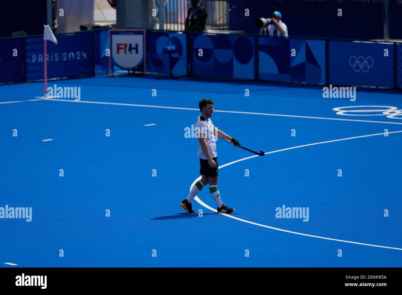 Ireland's Benjamin Walker walks during the men's field hockey match ...